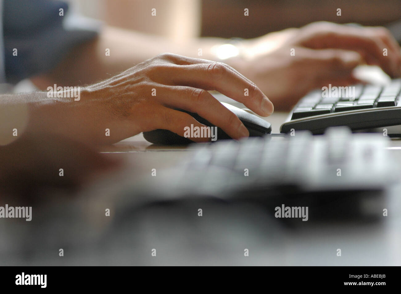Hands on computer keyboard Stock Photo - Alamy