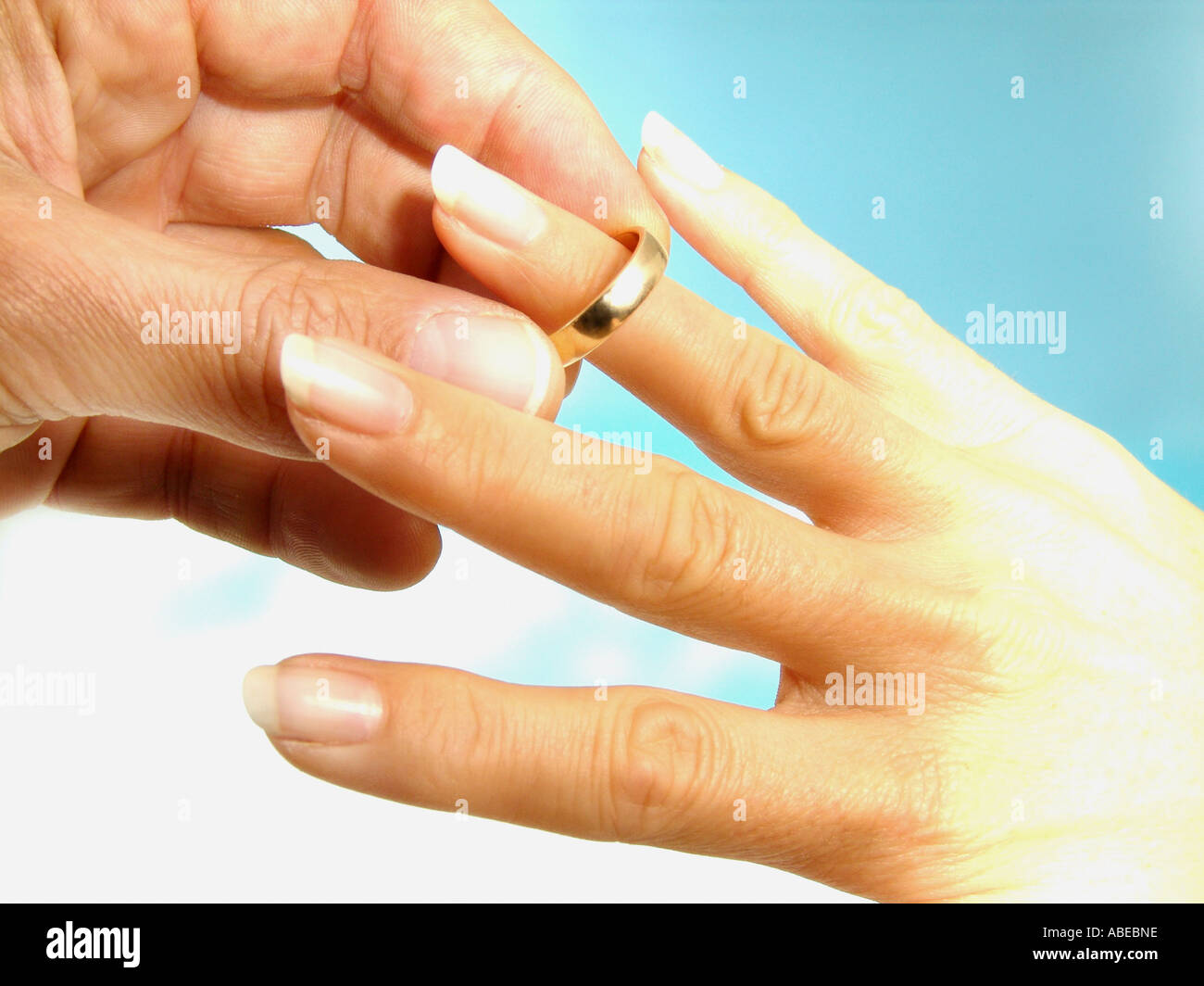 Hands with wedding ring Stock Photo - Alamy