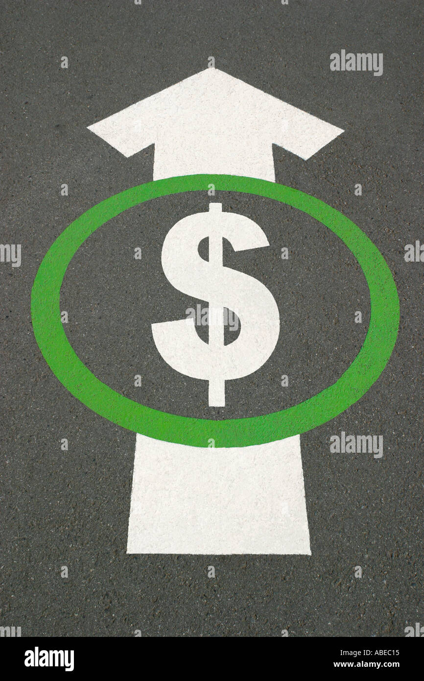 Dollar sign currency symbol with arrow pointing ahead or up painted on ...