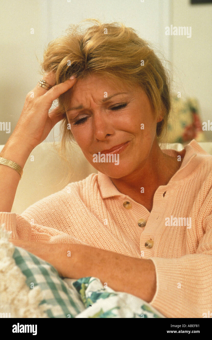 Middle aged blonde woman crying hi-res stock photography and images - Alamy