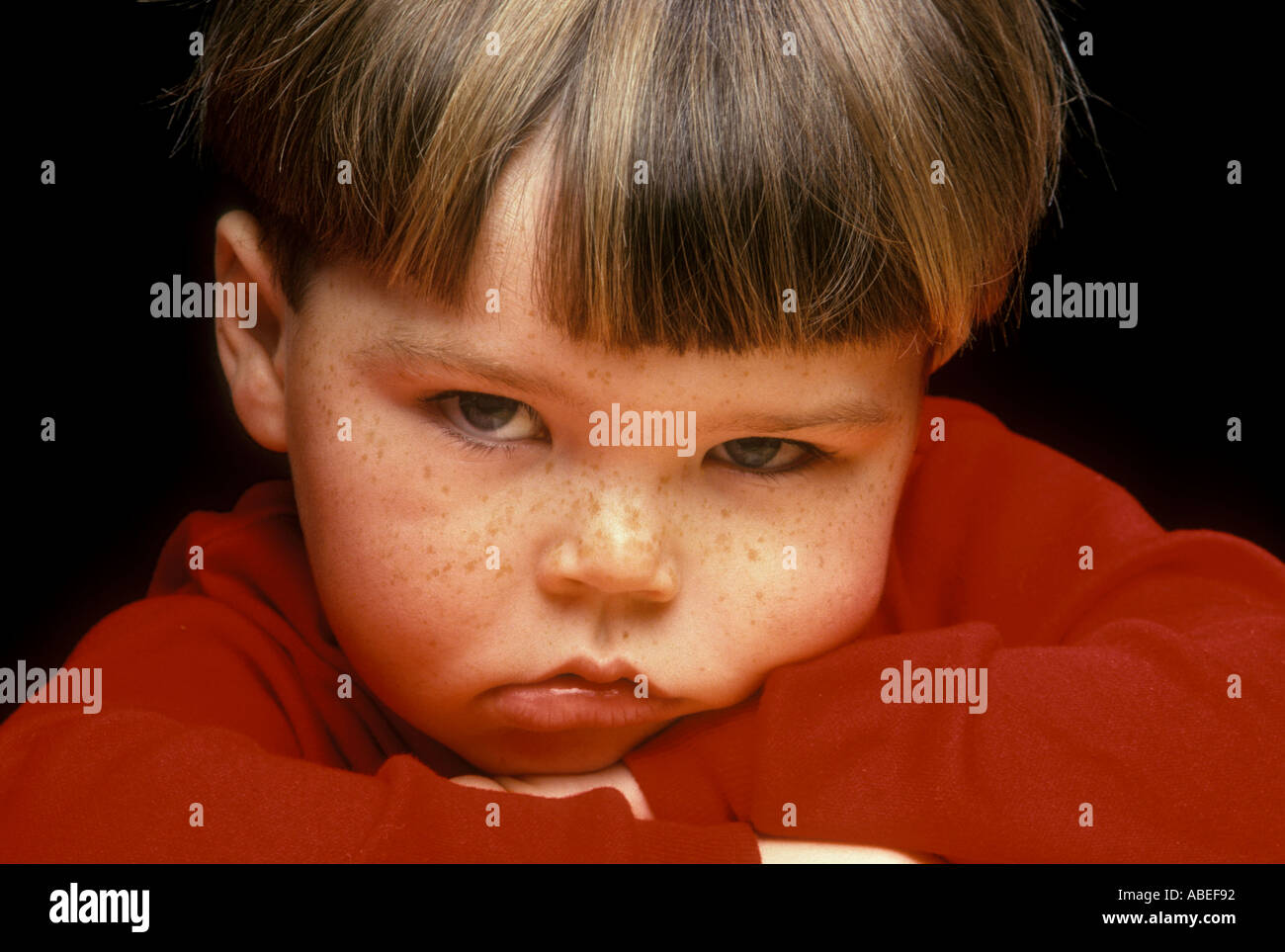 Little toddler boy looking sad Stock Photo - Alamy