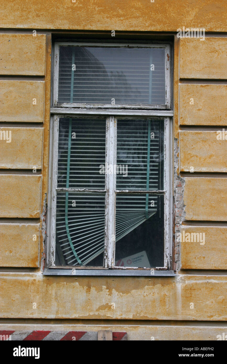Window with broken shutter Stock Photo - Alamy