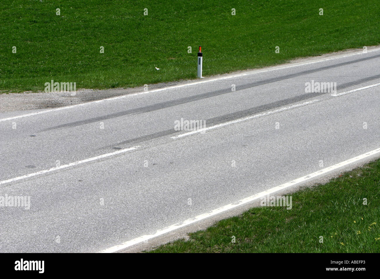 Brake trace on a road Stock Photo - Alamy