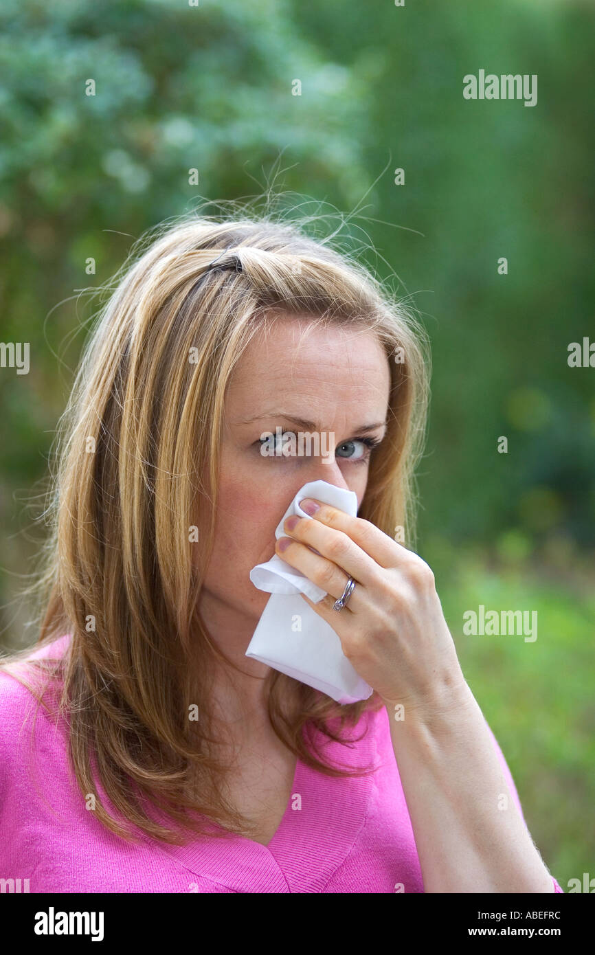 Young girl suffering from hay fever hi-res stock photography and images ...