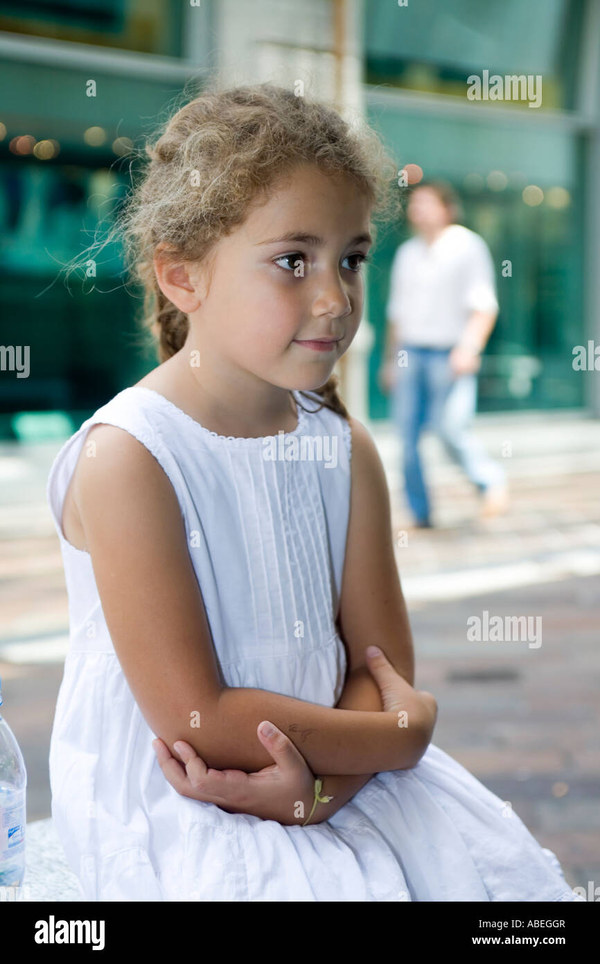 Little girl patiently waiting - urban scene Stock Photo - Alamy Little girl patiently waiting - urban scene Stock Photo - Alamy