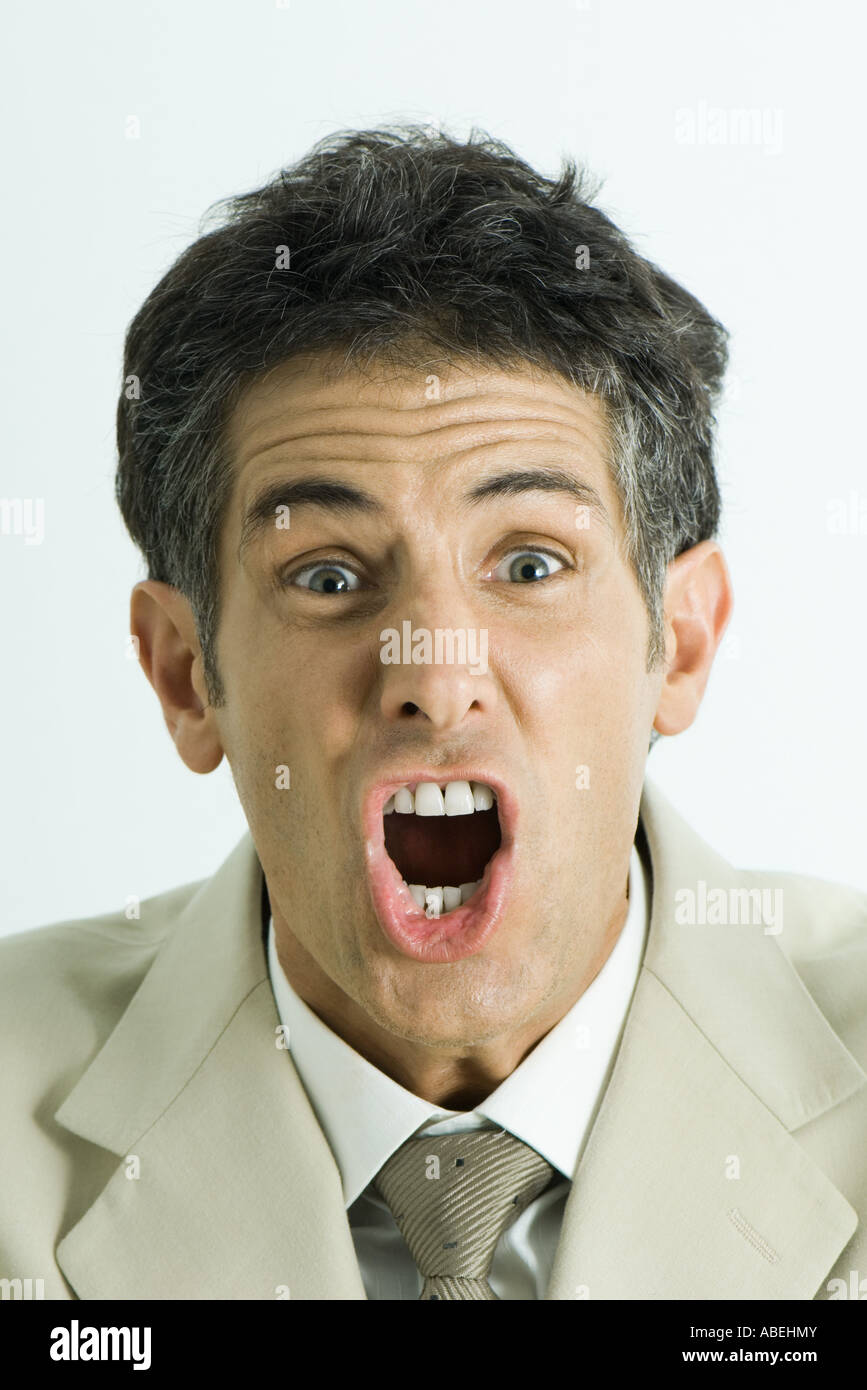 Man screaming, looking at camera, head and shoulders, portrait Stock ...