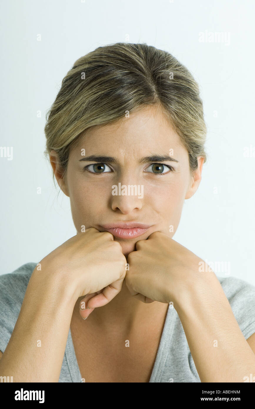 Woman pouting, head and shoulders, portrait Stock Photo - Alamy