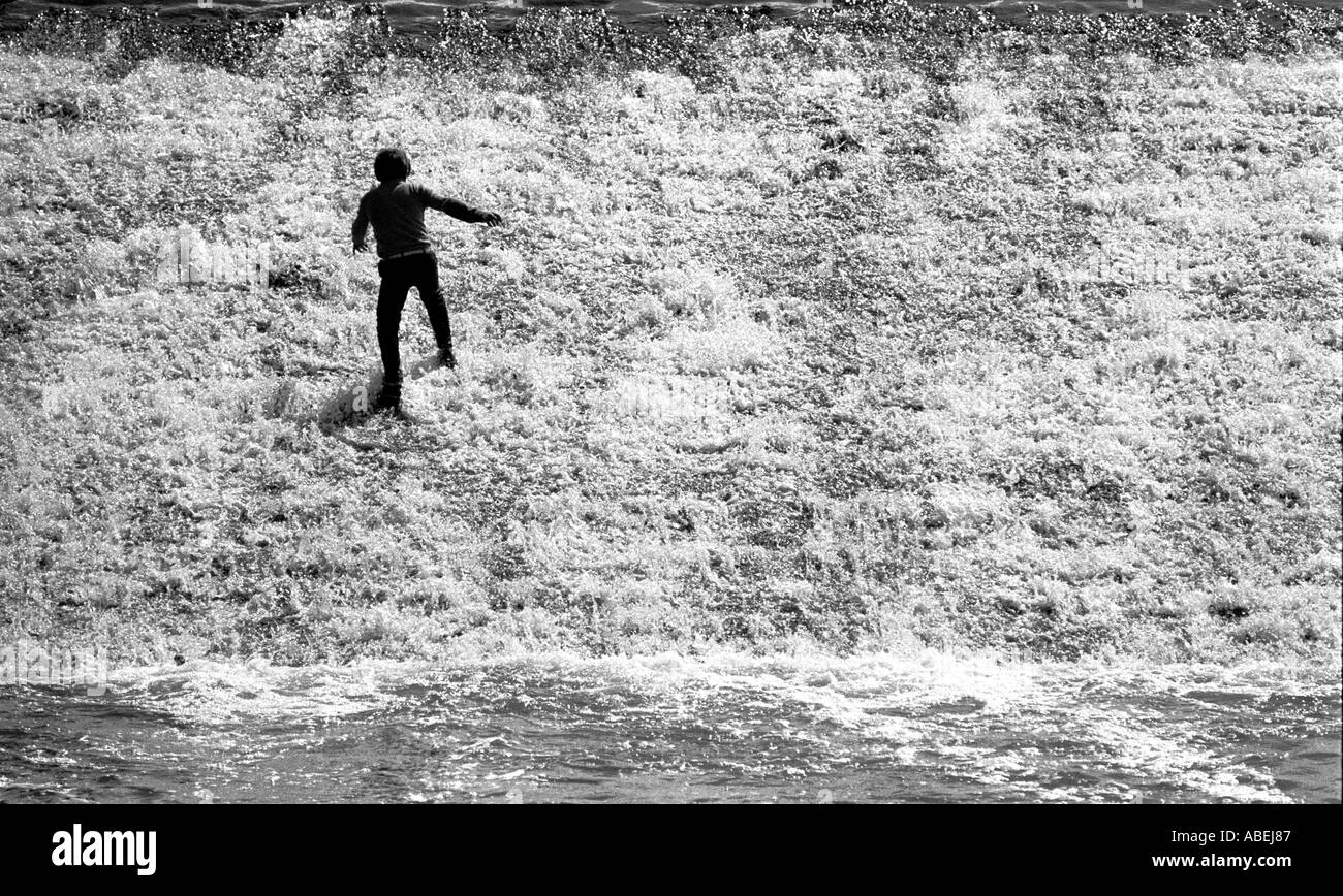 Boy in river Black and White Stock Photos & Images - Alamy