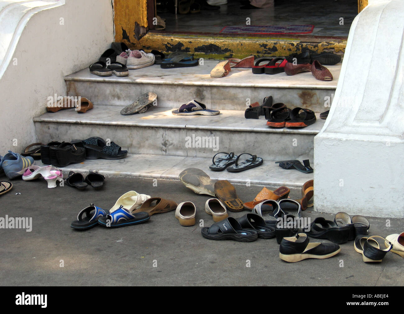 Footwear outside temple hi-res stock photography and images - Alamy
