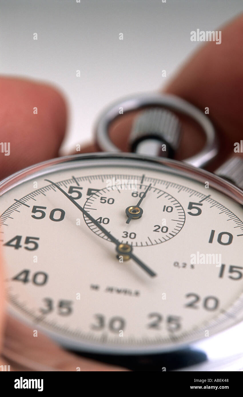HAND HOLDING STOP WATCH Stock Photo - Alamy