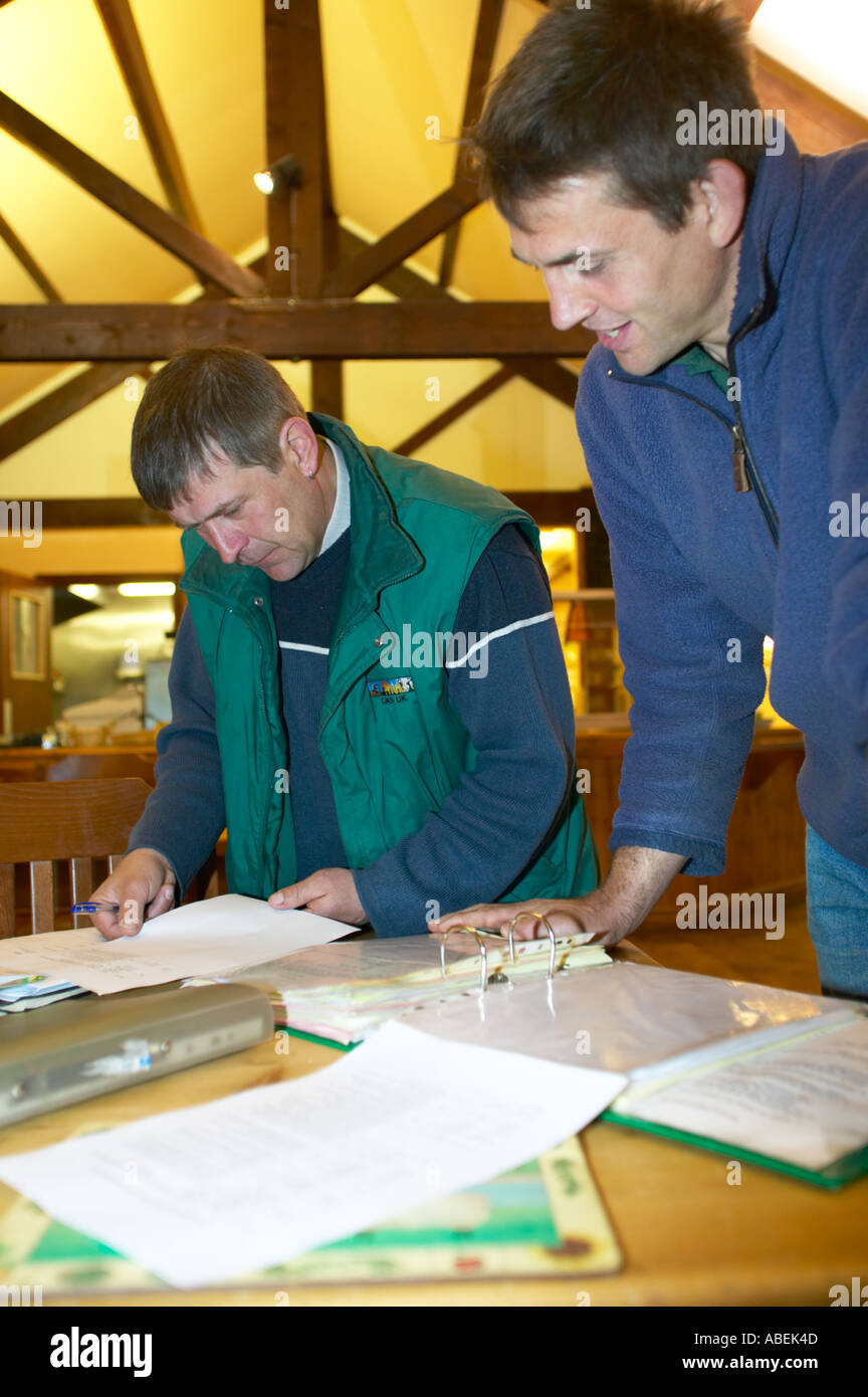 Farm being examined by Government inspector Stock Photo - Alamy