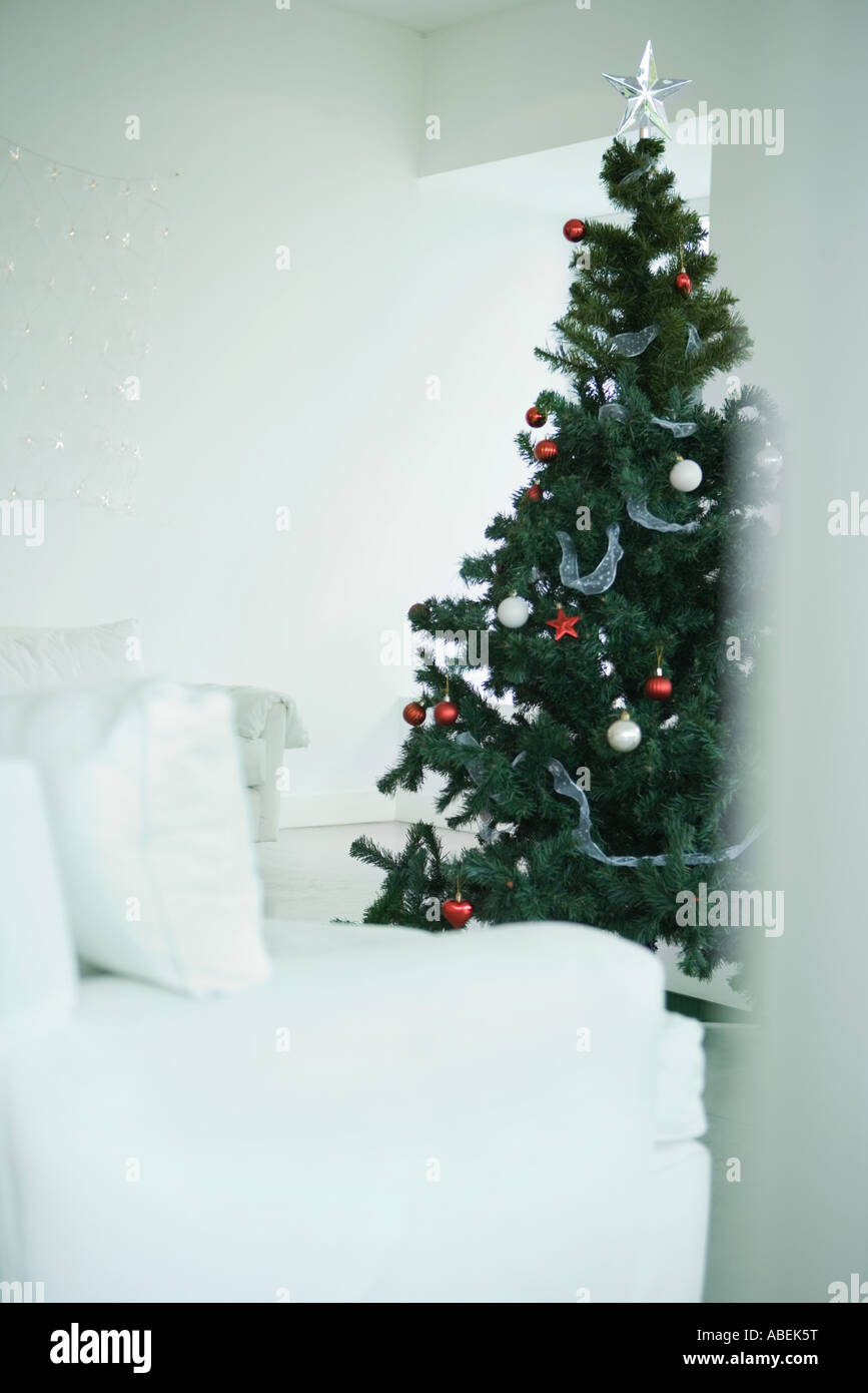 Sofa and Christmas tree Stock Photo - Alamy