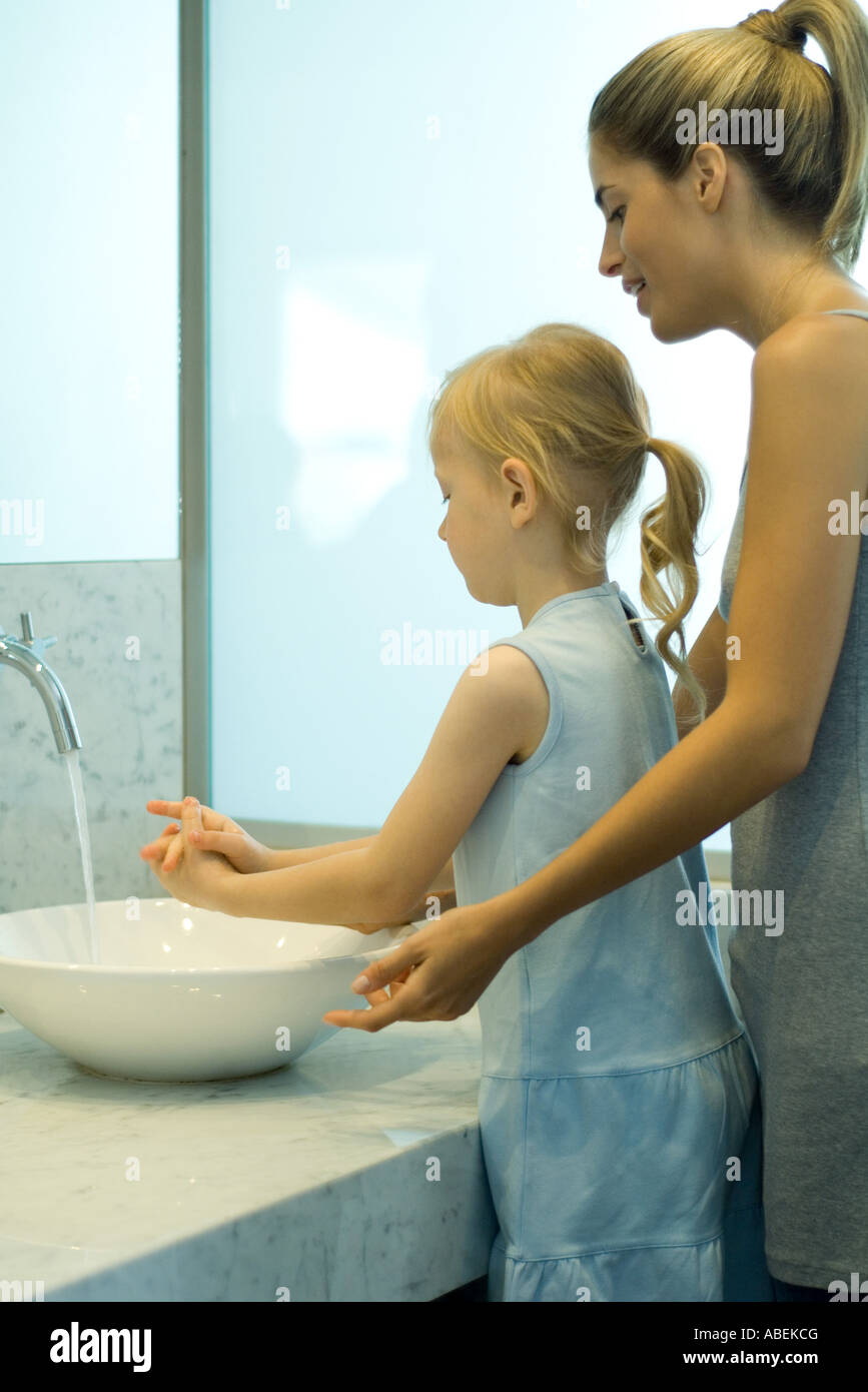 Mother and daughter washing hands together Stock Photo - Alamy Mother and daughter washing hands together Stock Photo - Alamy