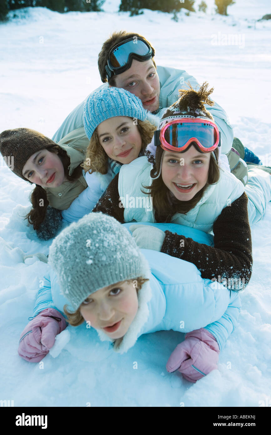 Young friends in snow, portrait Stock Photo - Alamy