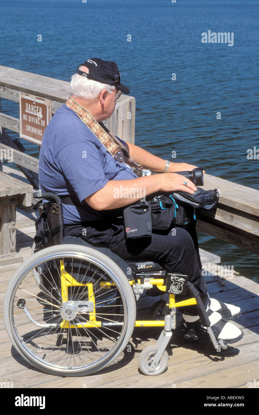 Disabled person in wheelchair Stock Photo - Alamy