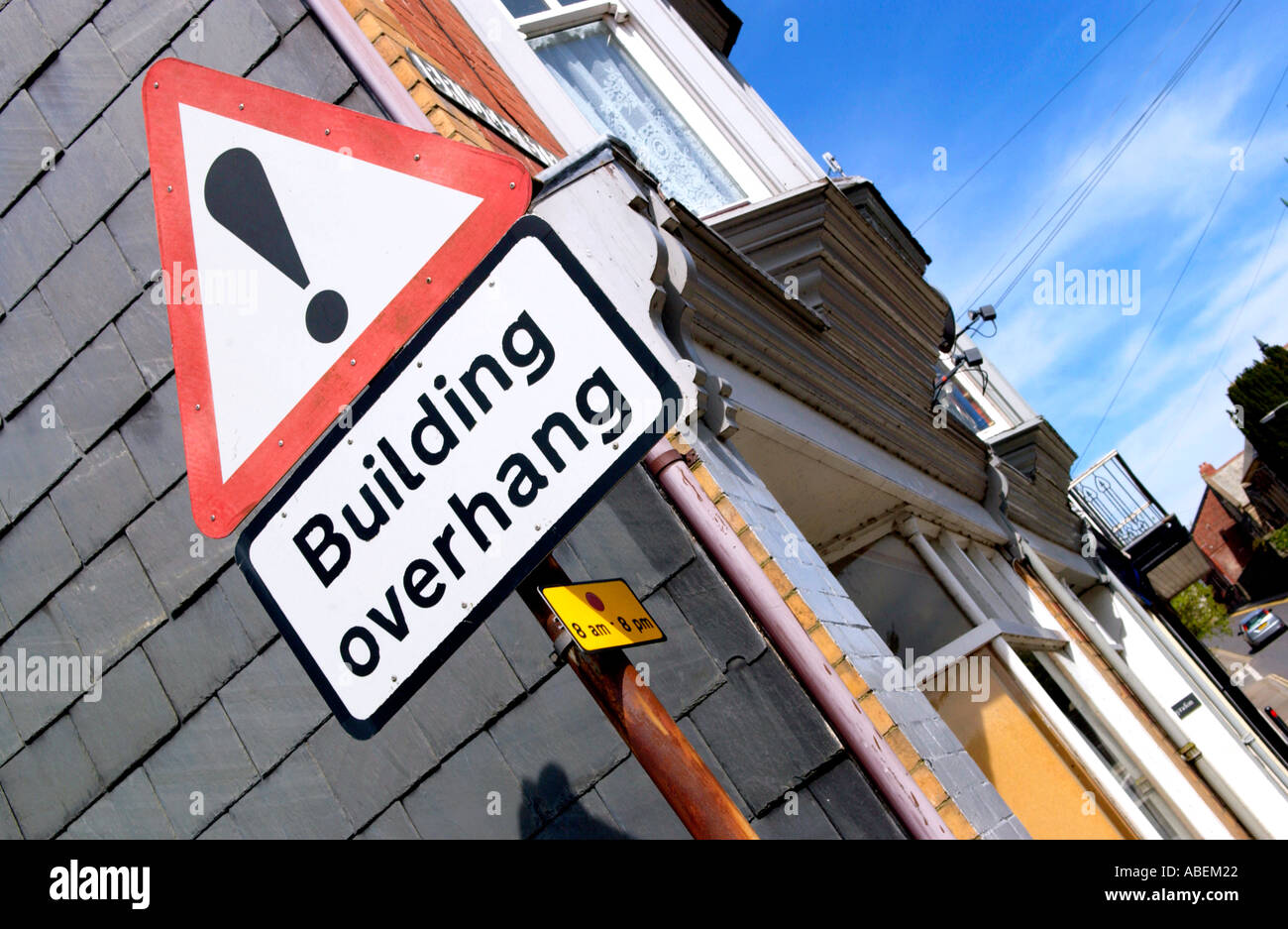 Building overhang sign in Rhayader Powys Mid Wales UK Stock Photo - Alamy