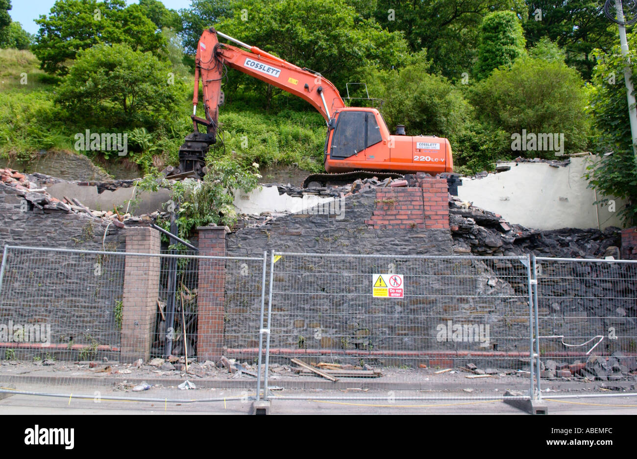 Terraced houses being demolished at Merthyr Vale near Merthyr Tydfil in ...