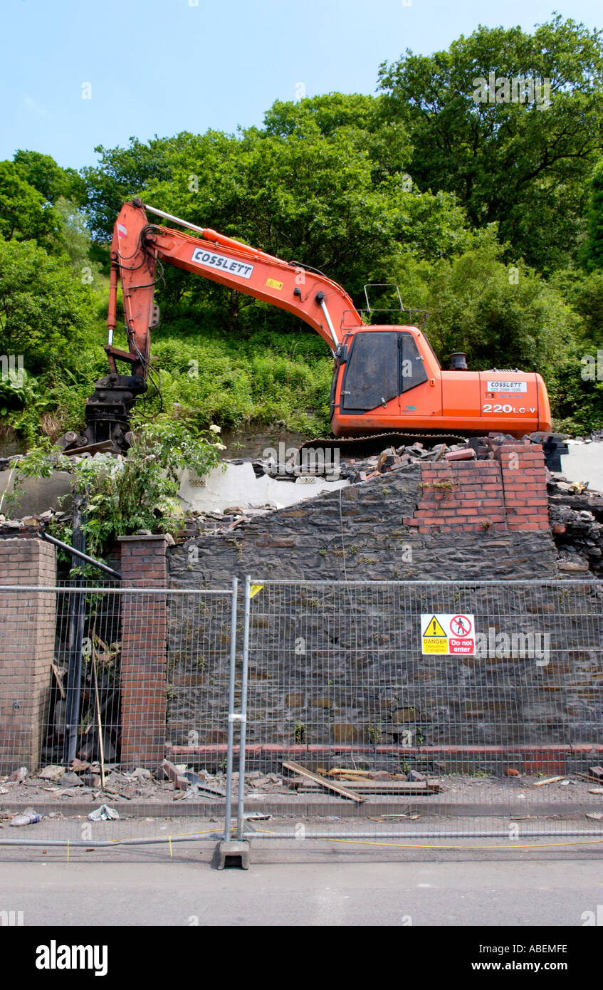 Terraced houses being demolished at Merthyr Vale near Merthyr Tydfil in ...