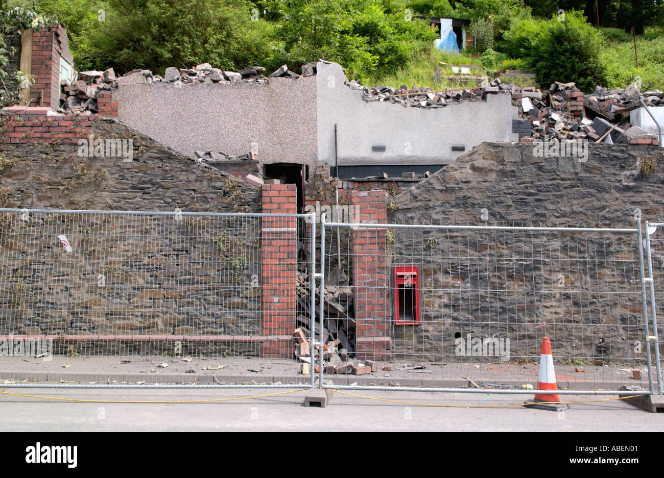 Terraced houses being demolished at Merthyr Vale near Merthyr Tydfil in ...