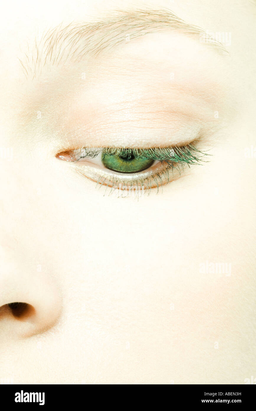 Teenage girl's face, eye lowered, extreme close-up Stock Photo - Alamy