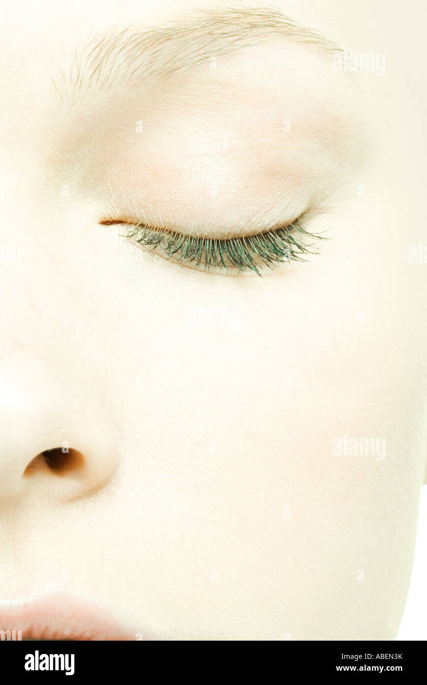 Teenage girl's face, eye closed, extreme close-up Stock Photo - Alamy