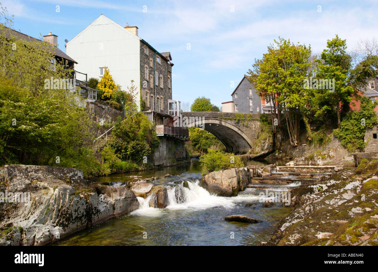 Riverside house and bridge over the River Wye at Rhayader Powys Mid ...