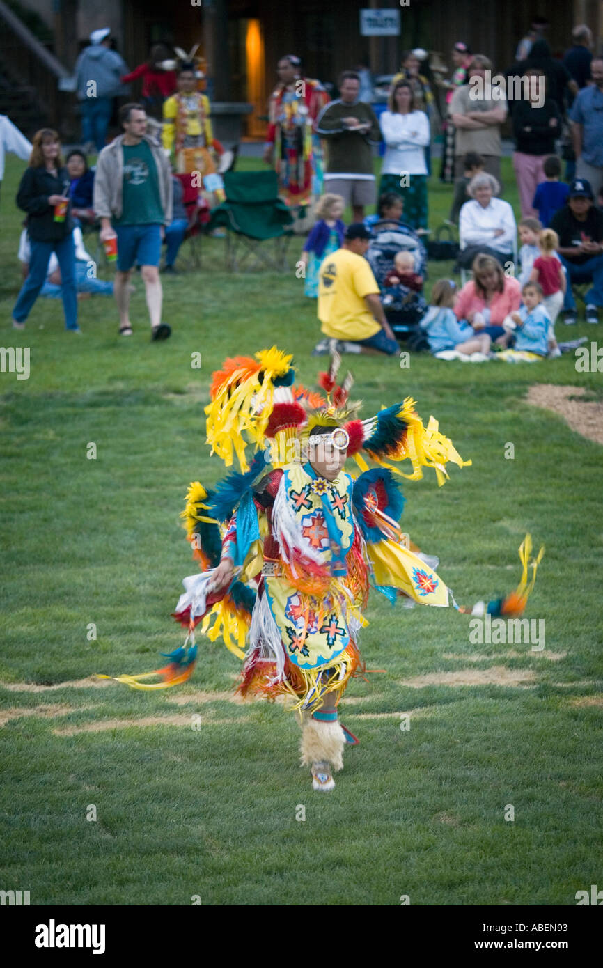 A Native American in full regalia takes part in a fancy dance contest ...