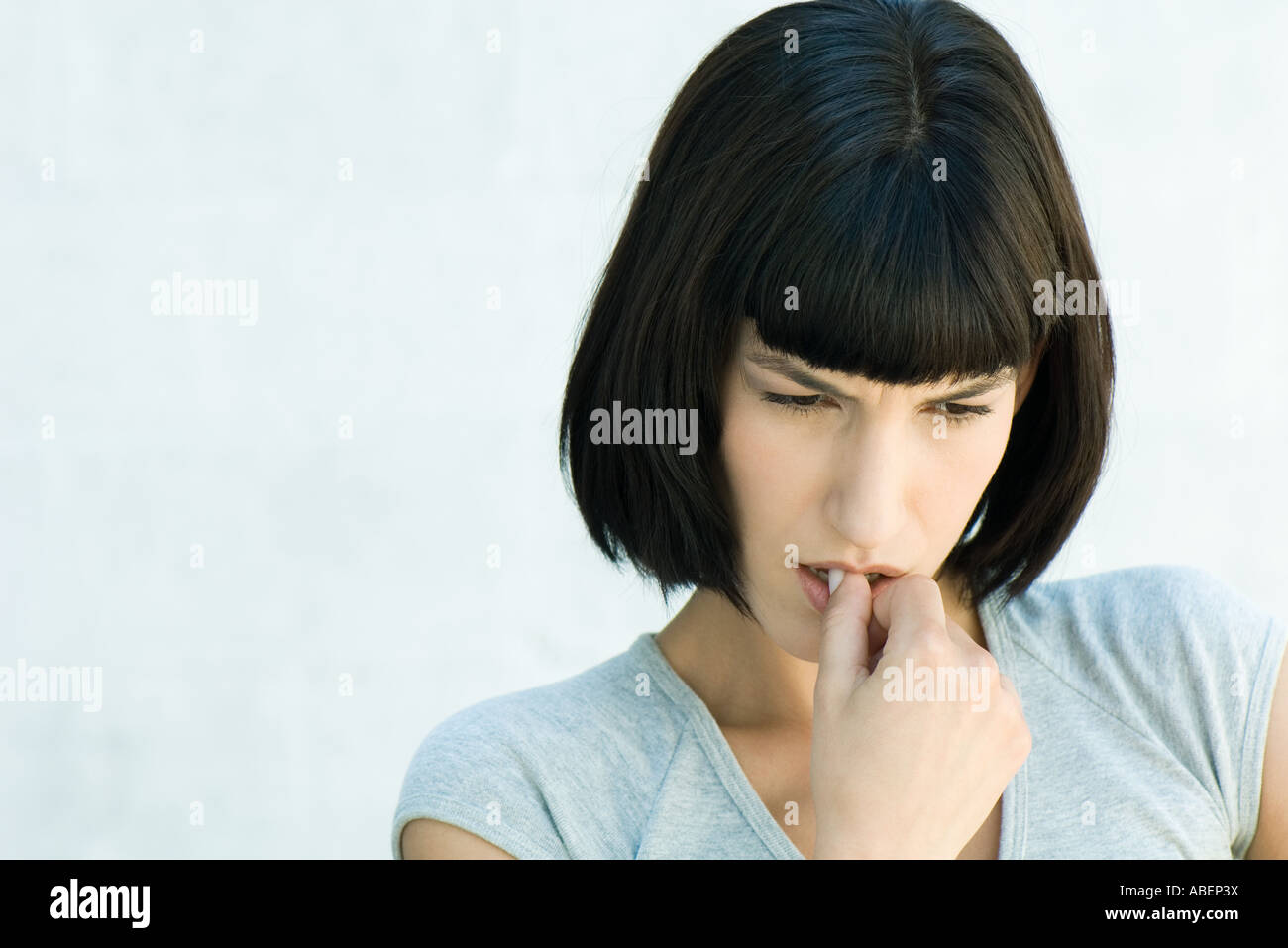 Woman, biting fingers, portrait Stock Photo - Alamy