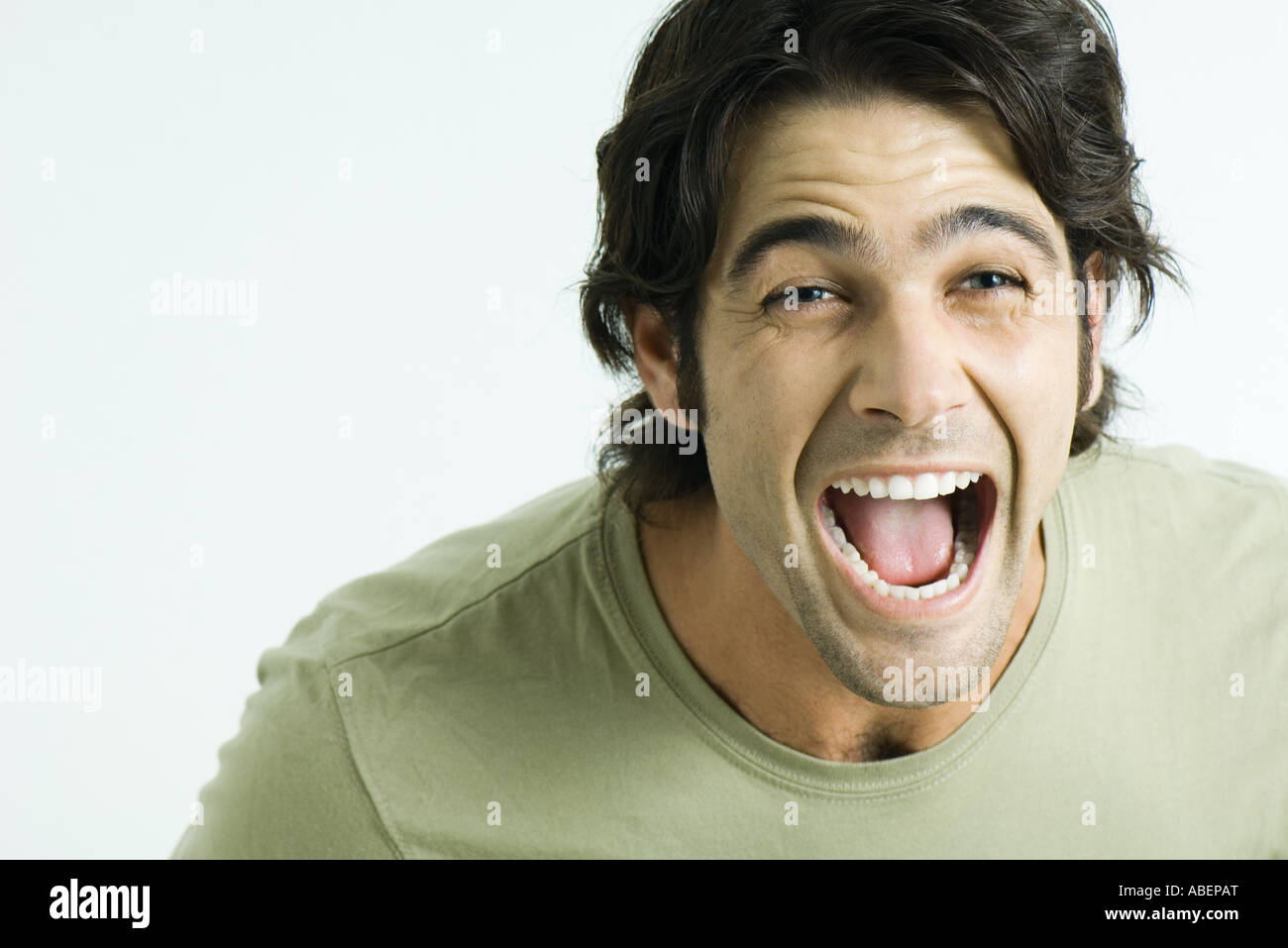 Man, mouth wide open and eyebrows raised, portrait Stock Photo - Alamy
