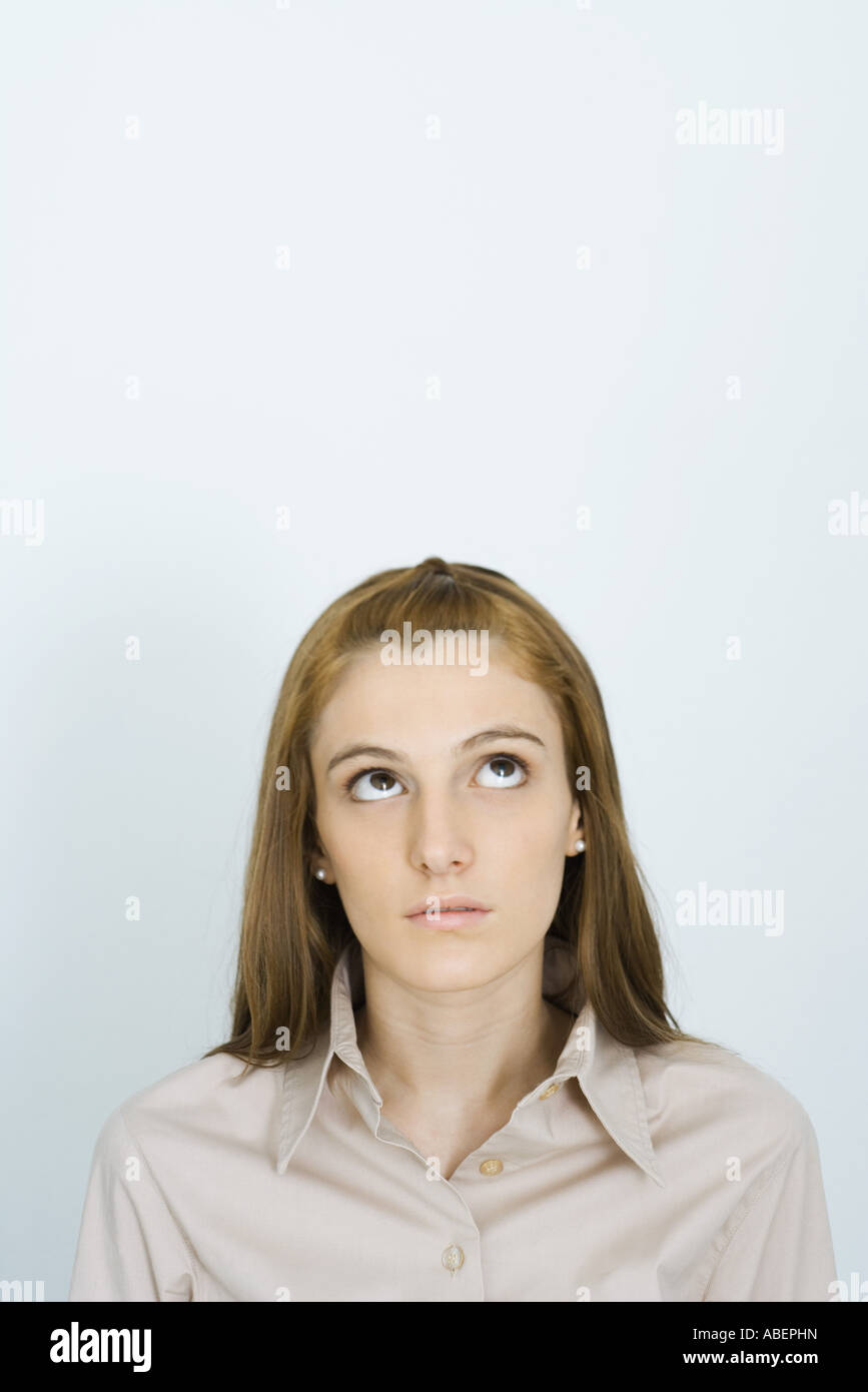 Young woman, looking up, portrait Stock Photo - Alamy