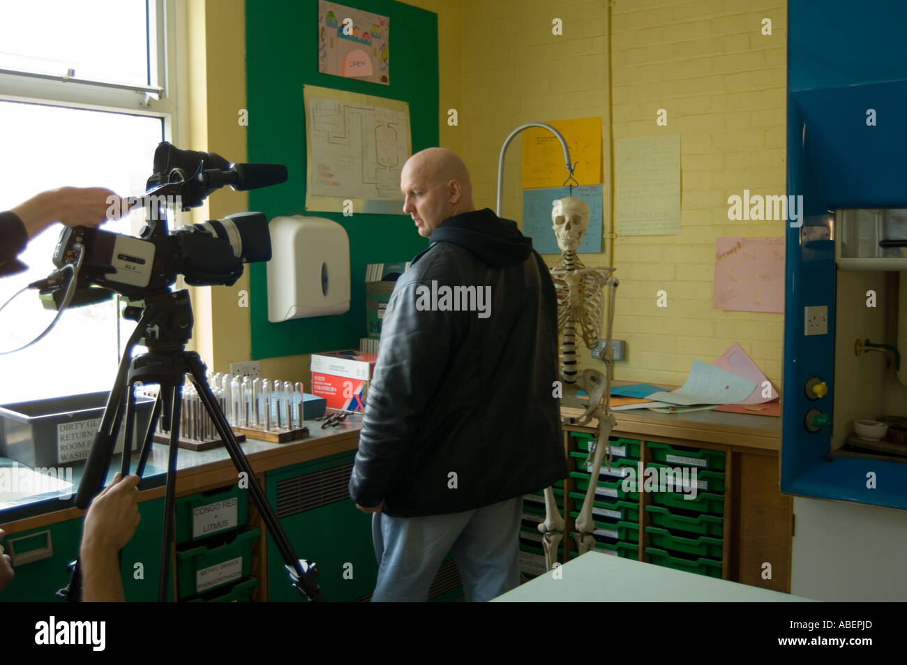 A film crew working on set with Robert Stone actor from Gavin and ...