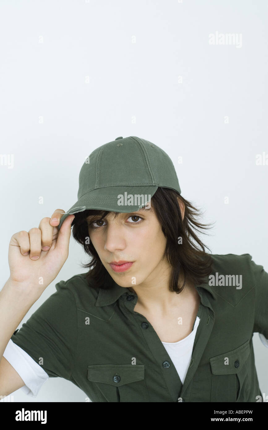 Teen boy wearing cap, portrait Stock Photo - Alamy