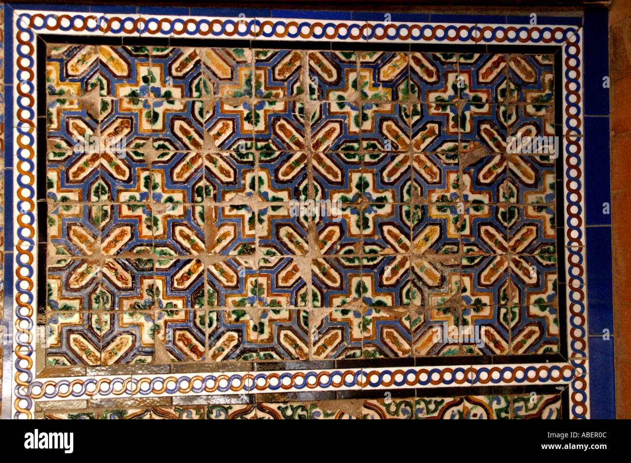 Moorish patterns on tiles in Alcazar former moorish fortress in Seville ...