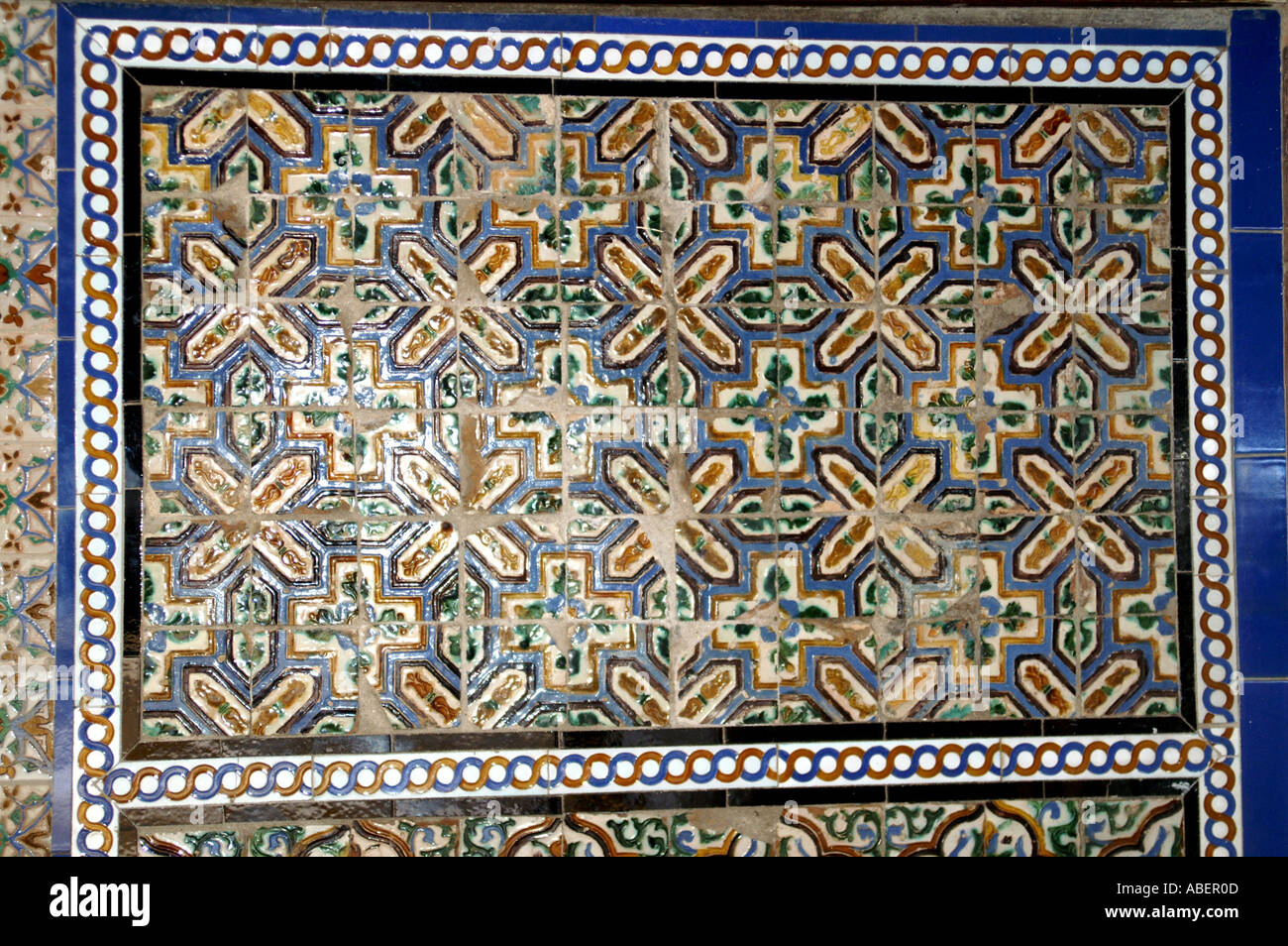 Moorish patterns on tiles in Alcazar former moorish fortress in Seville ...