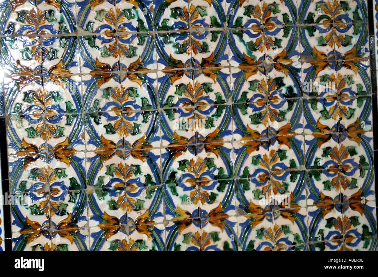 Moorish patterns on tiles in Alcazar former moorish fortress in Seville ...