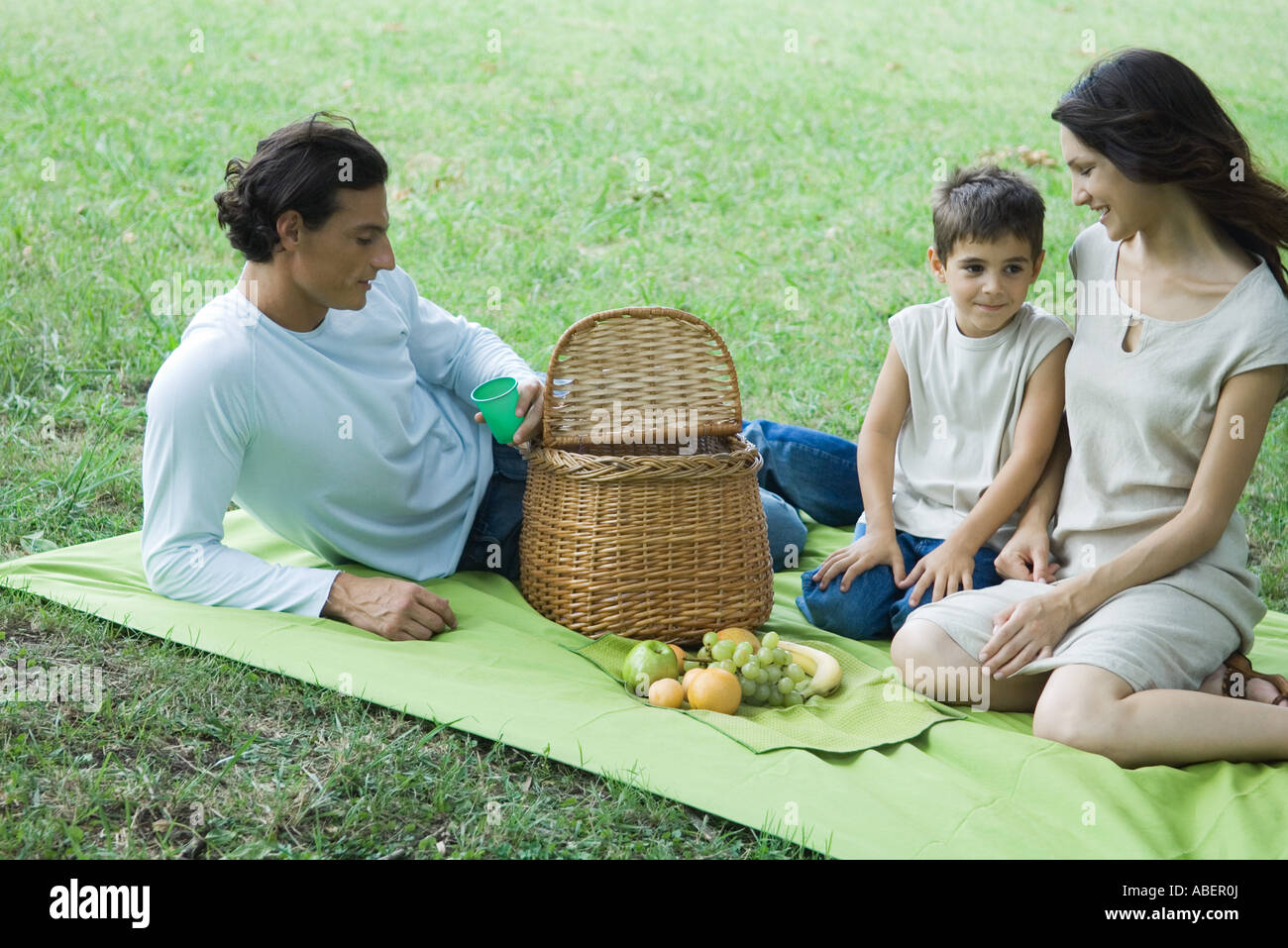 Family having picnic Stock Photo - Alamy