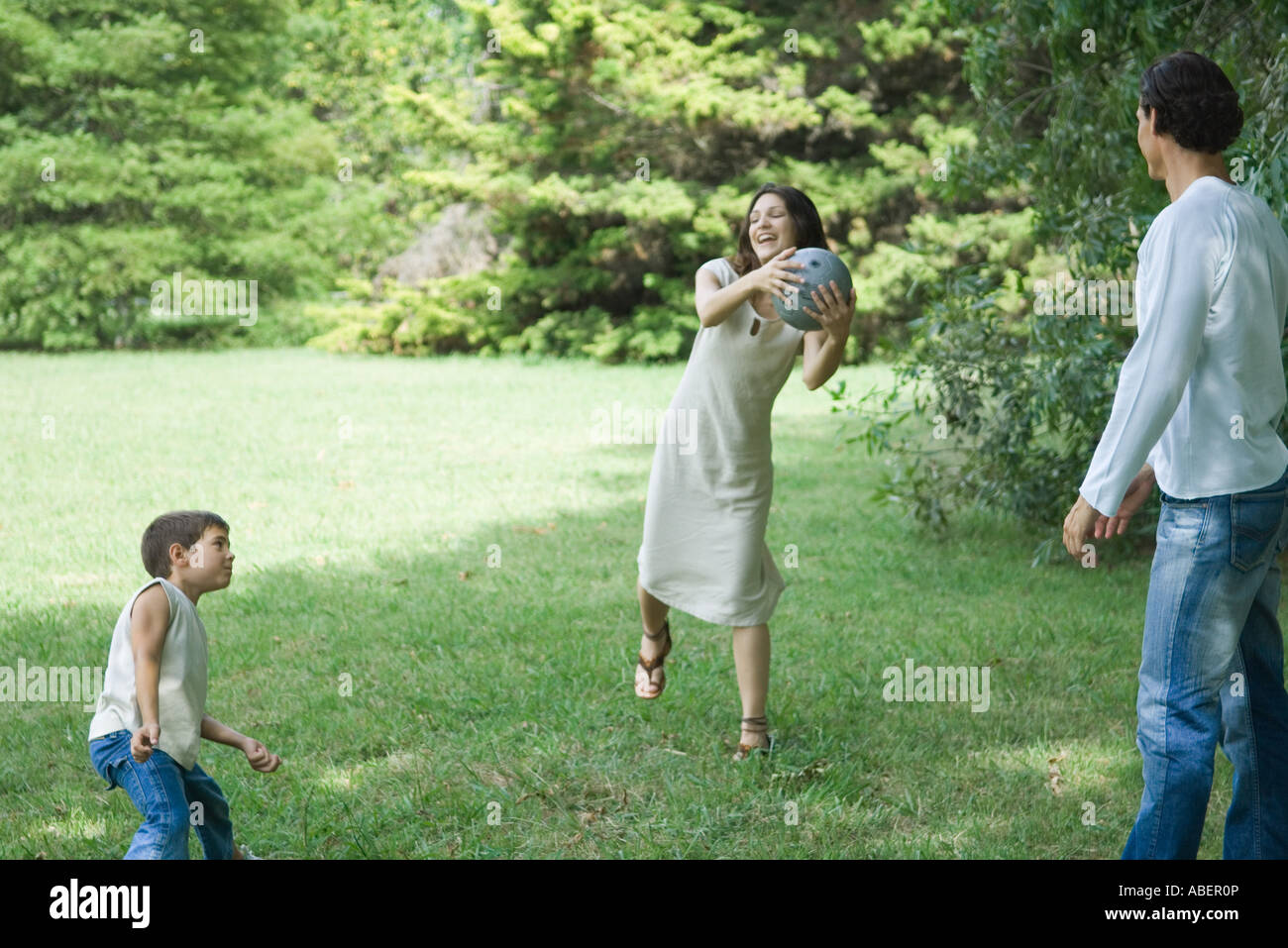 Children throwing ball to each other hi-res stock photography and ...