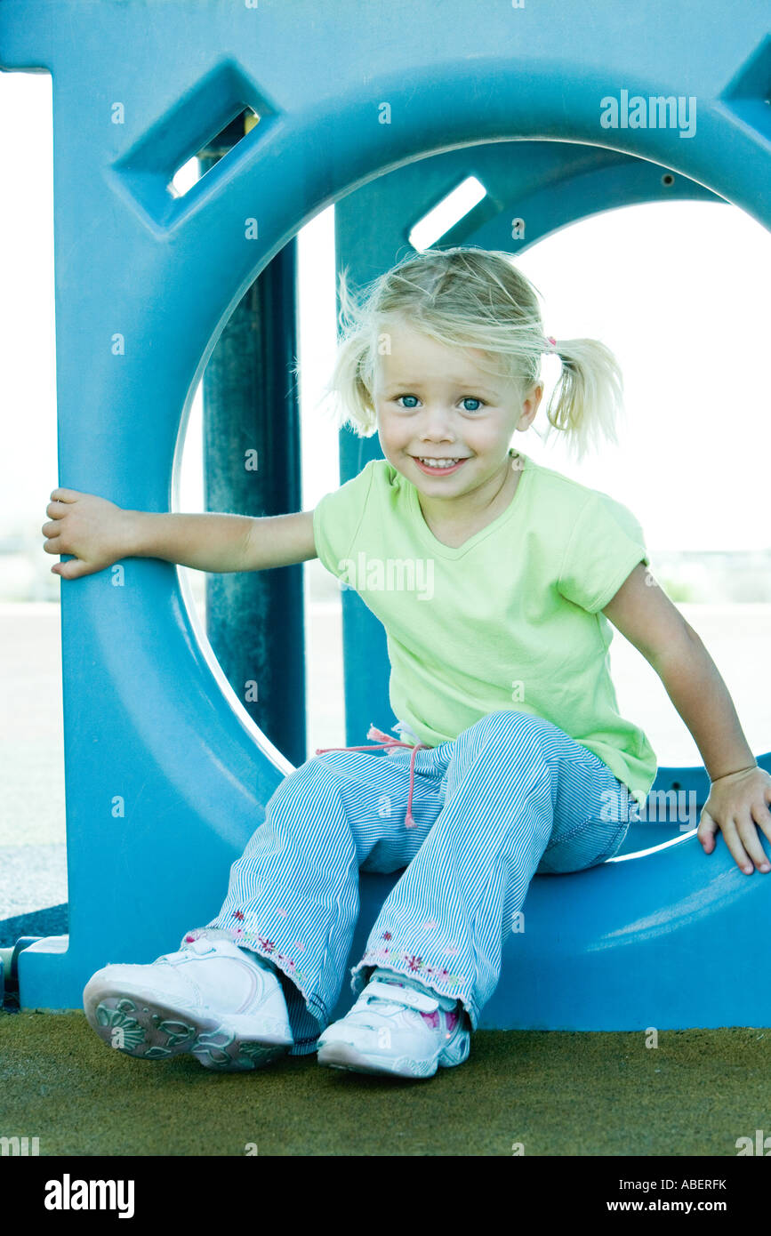 Child on playground equipment Stock Photo - Alamy