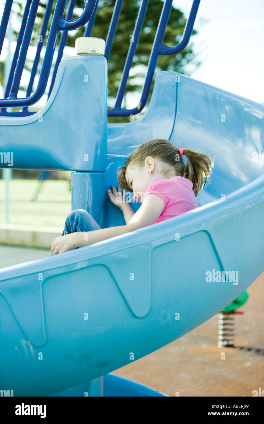 Child on playground equipment Stock Photo - Alamy