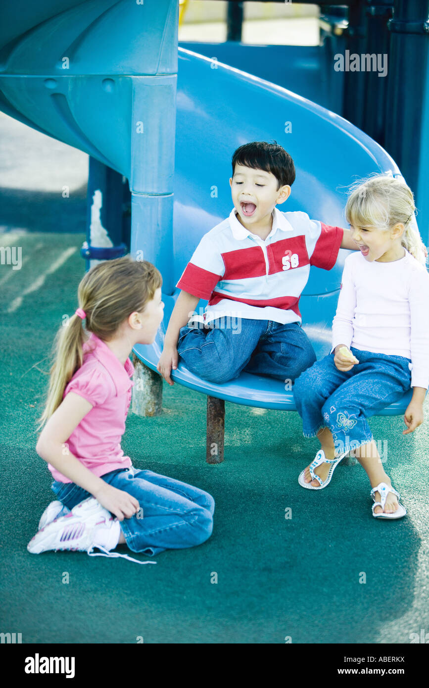 Children on playground equipment Stock Photo - Alamy
