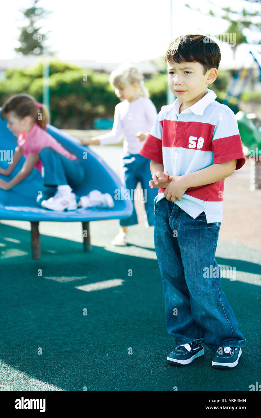 Boy crying in playground hi-res stock photography and images - Alamy