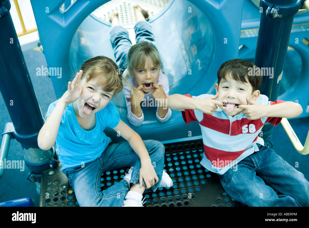 Children on playground equipment Stock Photo - Alamy