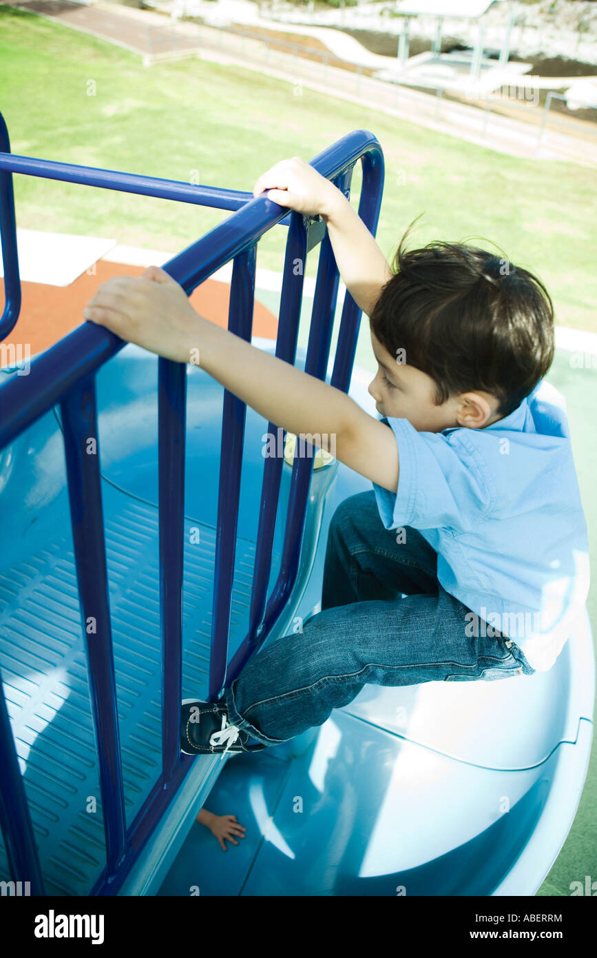 Child on playground equipment Stock Photo - Alamy