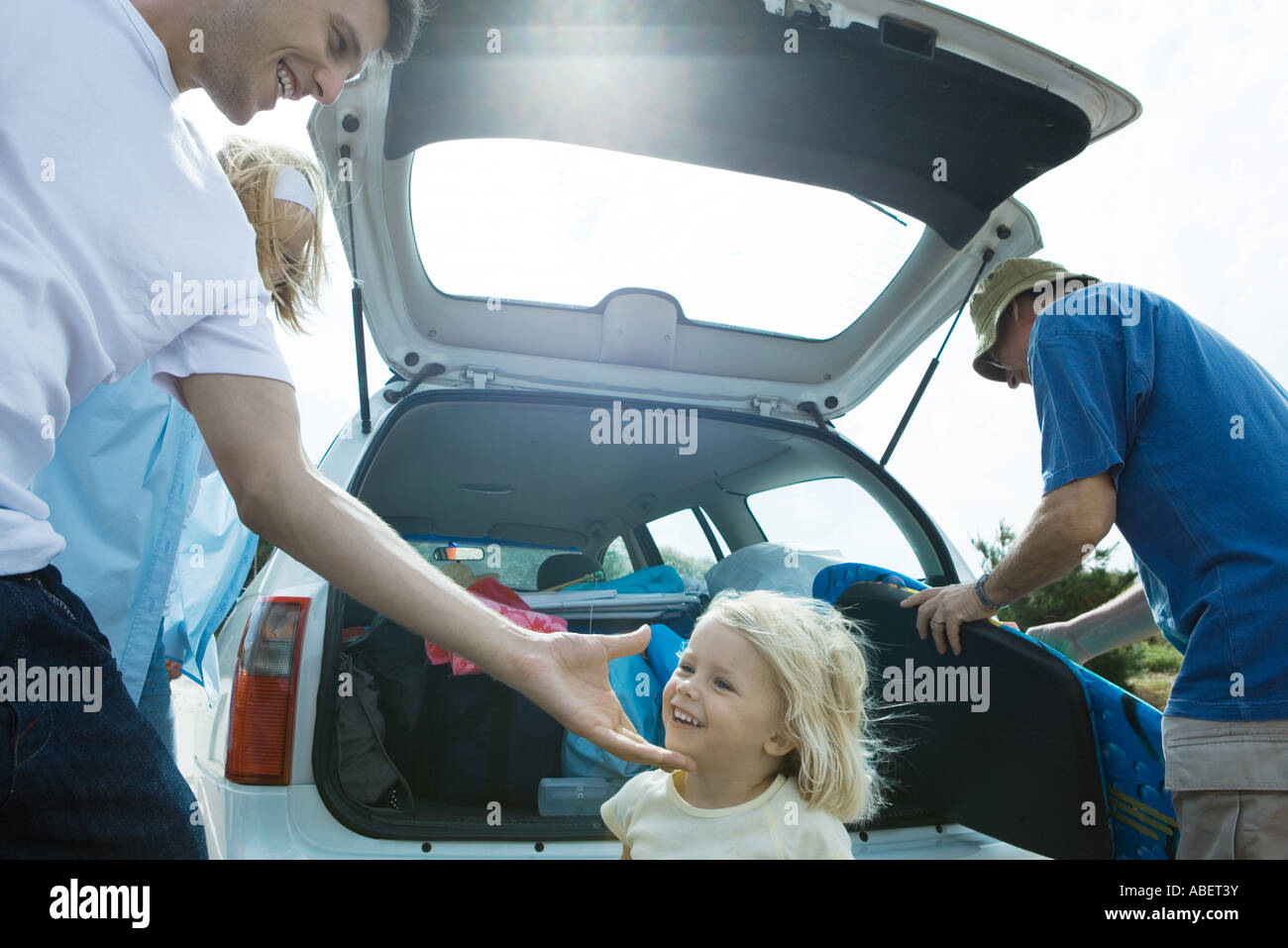 Unloading bags from car hi-res stock photography and images - Alamy