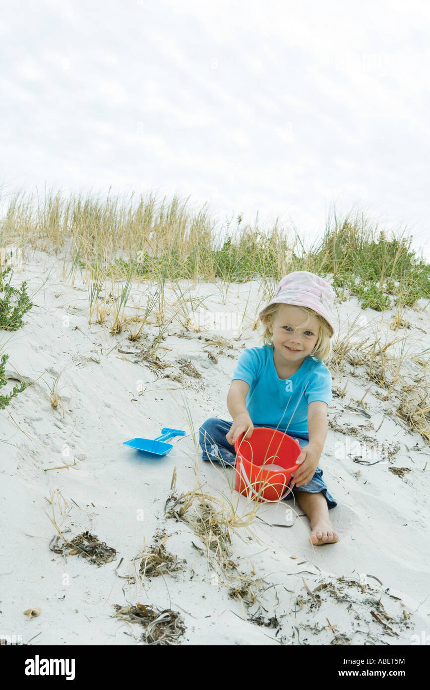 Child playing in sand Stock Photo - Alamy