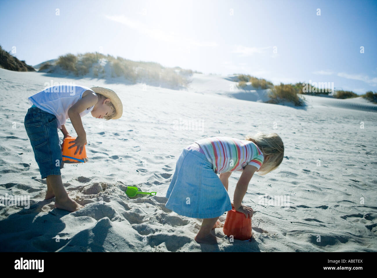 Children playing in sand Stock Photo - Alamy