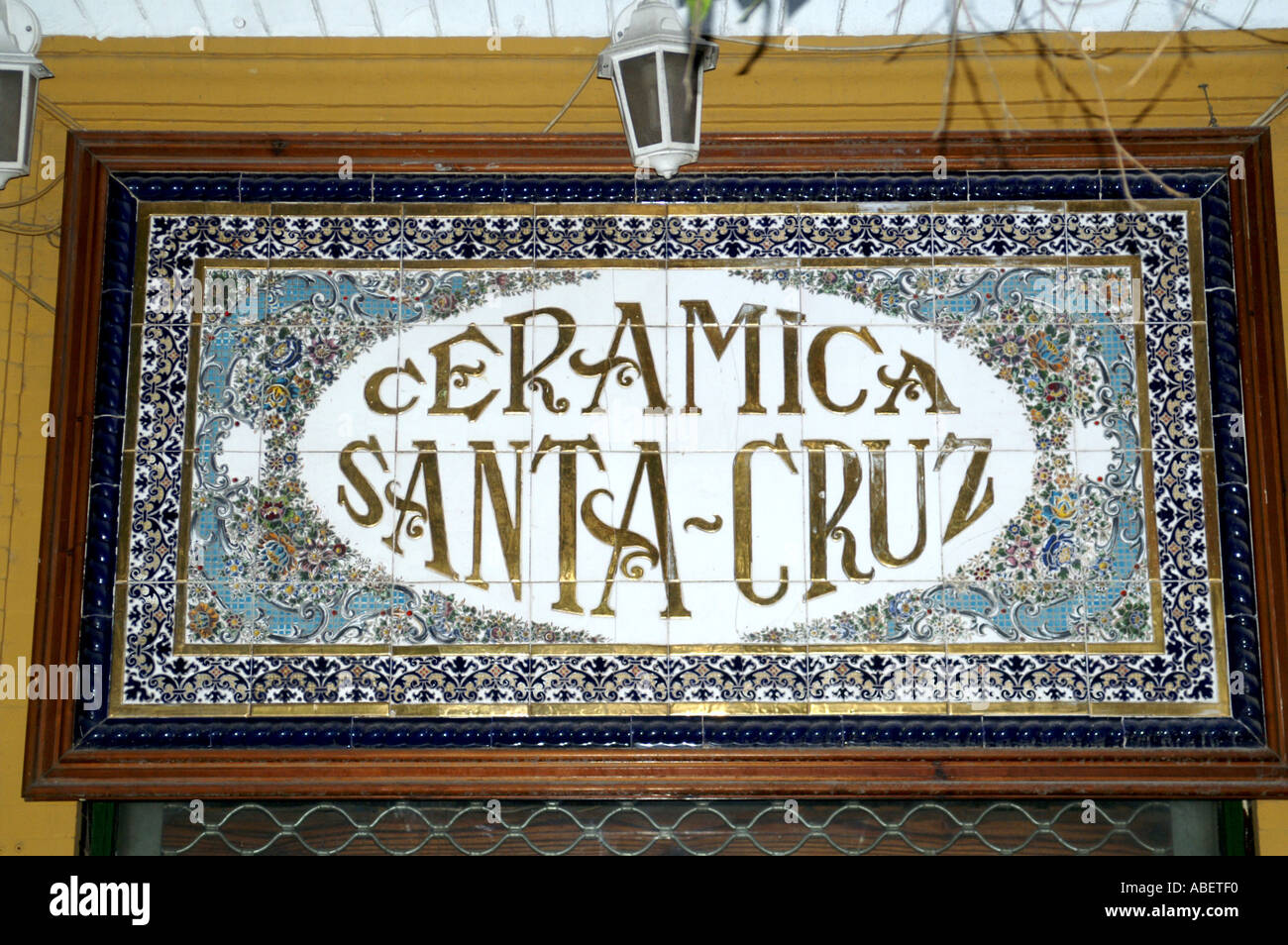 Ceramica Santa Cruz sign in Seville Andalucia Spain Stock Photo - Alamy