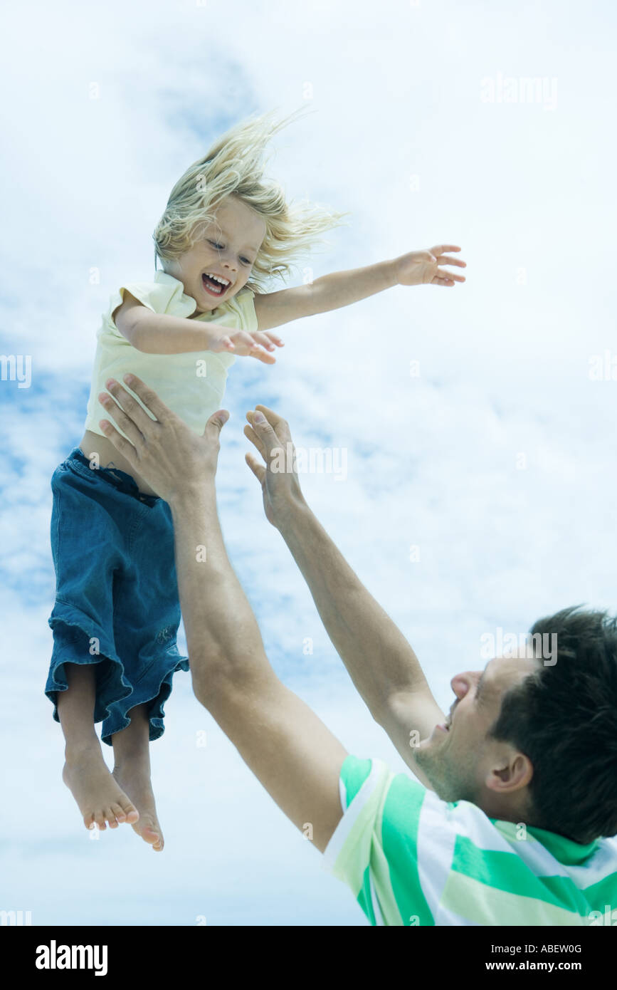 Man throwing child air catching hi-res stock photography and images - Alamy