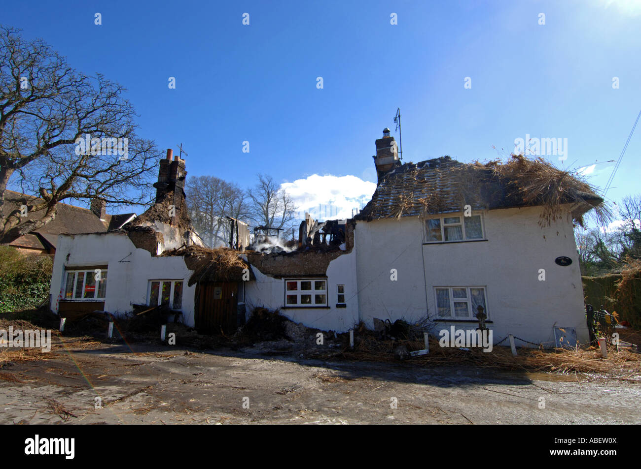 Burnt out thatched cottage in Piddlehinton, Dorset, Britain, UK Stock ...