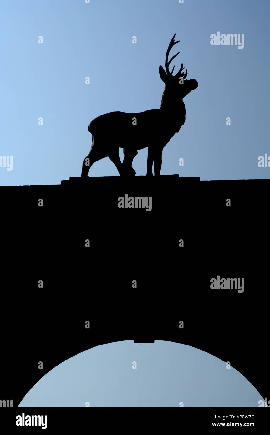 Five legged statue of a stag on an arched gateway at the Drax estate in ...